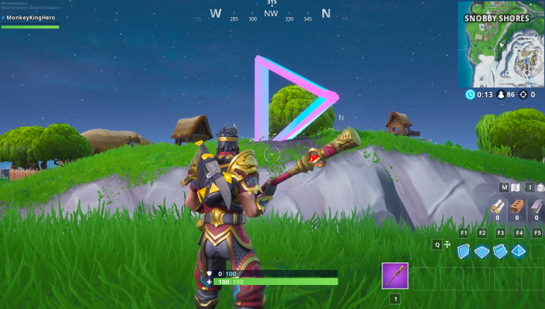 A large neon triangle ring has crashed beside Snobby Shores in Fortnite ...